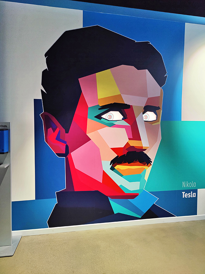 Nikola Tesla watches in geometric, technicolor splendor, probably thinking, "If only they'd listened to my other ideas this enthusiastically."