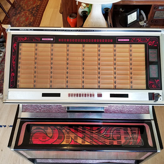 The Rock-Ola jukebox&mdash;when music required quarters and patience. This beauty once soundtracked countless first dances and last calls.
