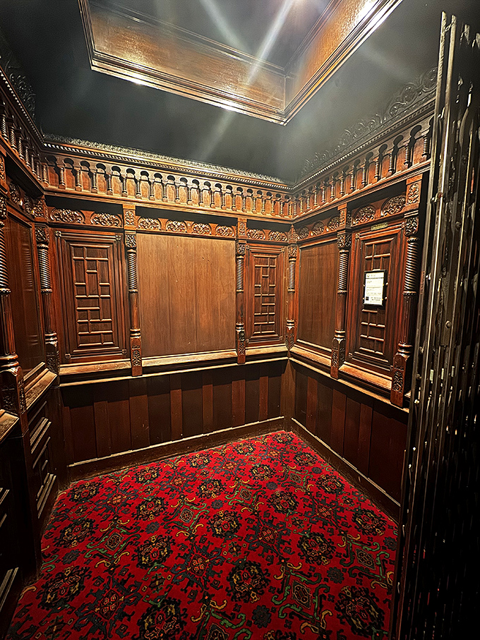 Wood-paneled perfection that makes modern elevators look like metal boxes. This is what "going up in the world" literally meant.