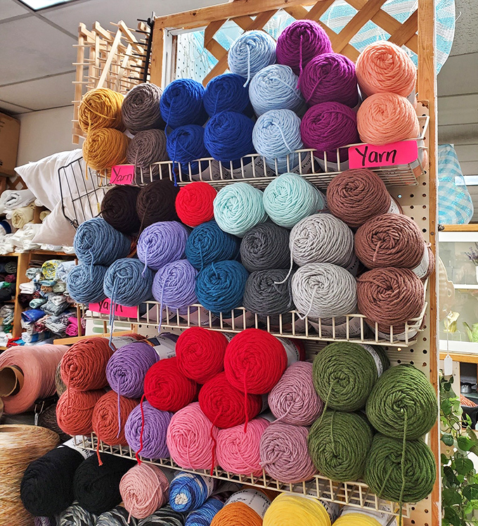 Crafters gravitate to this color wheel of yarn possibilities, where abandoned projects become new creative beginnings.