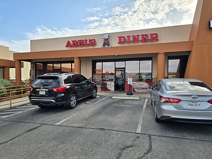 Abel's Diner's warm terra cotta building promises hearty meals and friendly service. That chef logo knows what's cooking inside!