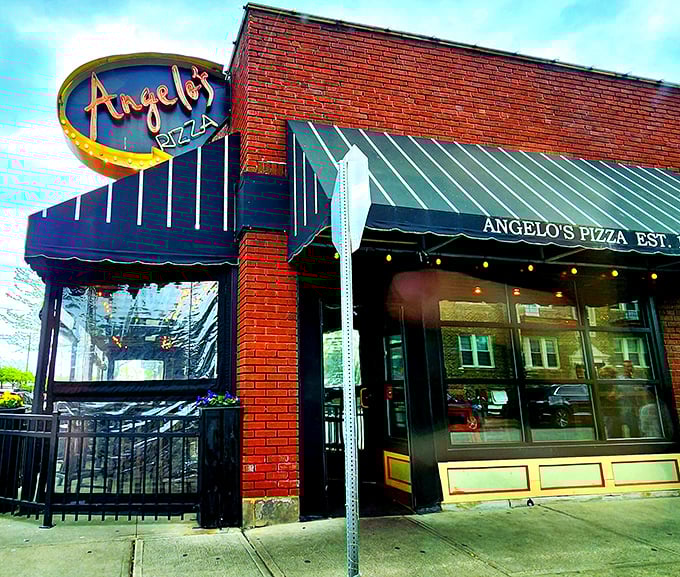 Angelo's corner spot catches sunlight like it catches the hearts of pizza lovers&mdash;brilliantly and without effort.