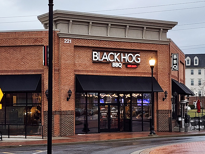 Black Hog's brick facade fits perfectly into Frederick's historic charm. Those black awnings have sheltered generations of sauce-stained smiles.