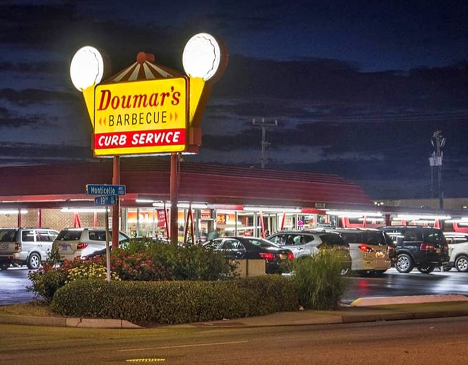 When the sign glows at twilight and the parking lot fills up, you know you've found where locals go for real barbecue.