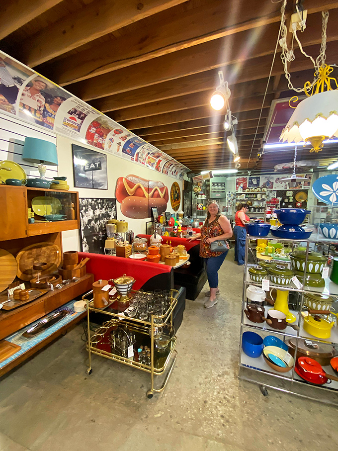 Treasure hunters navigate this colorful maze of decades past, where every shelf holds potential nostalgic gold.