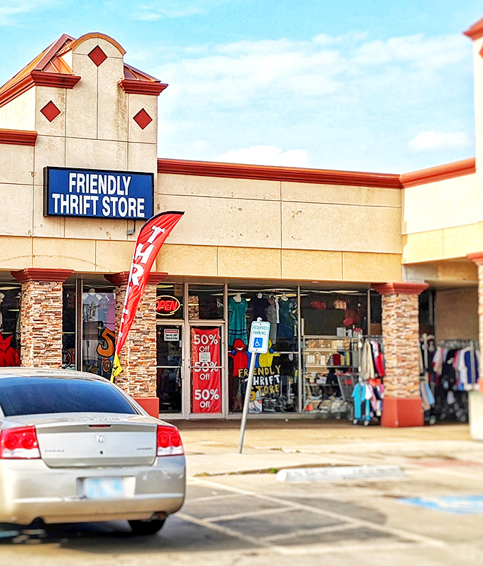 Friendly Thrift Store's distinctive architecture stands out like a beacon for bargain hunters. Those 50% off signs aren't kidding around!