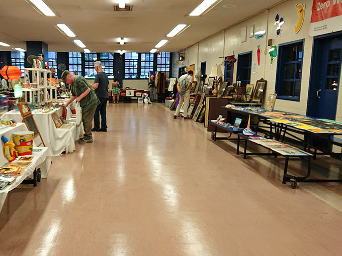 Upper West Side elegance meets flea market excitement under white tents that flutter like flags of treasure. 