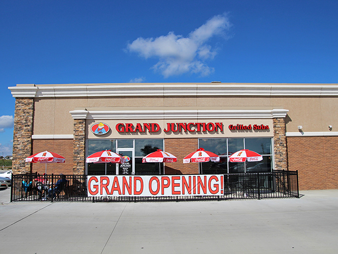 Grand Junction's "Grand Opening" banner hints at fresh beginnings. Those Coca-Cola umbrellas practically scream "summer sandwich party!"