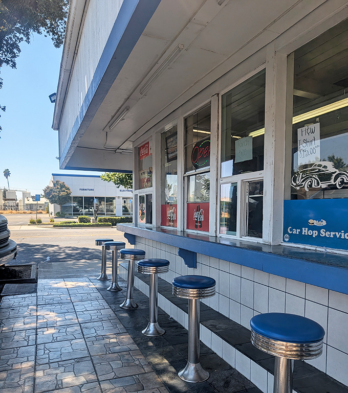 H&W's classic drive-in counter with its old-school stools - a burger joint frozen deliciously in time.