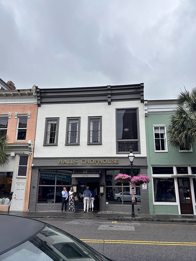 Halls Chophouse blends seamlessly into Charleston's historic King Street, its classic facade hiding culinary treasures within.