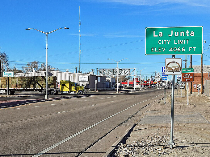 La Junta welcomes travelers with its iconic green sign. At 4,066 feet, the cost of living stays refreshingly low!