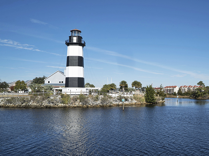 Little River's iconic lighthouse stands guard over tranquil waters. A coastal landmark that welcomes both visitors and returning locals.