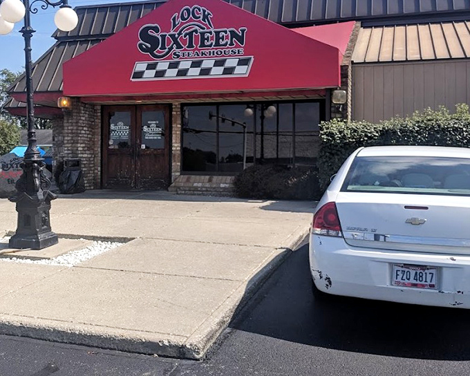 Lock Sixteen's racing-inspired awning hints at its local roots. This humble exterior hides western Ohio's best-kept steak secret.