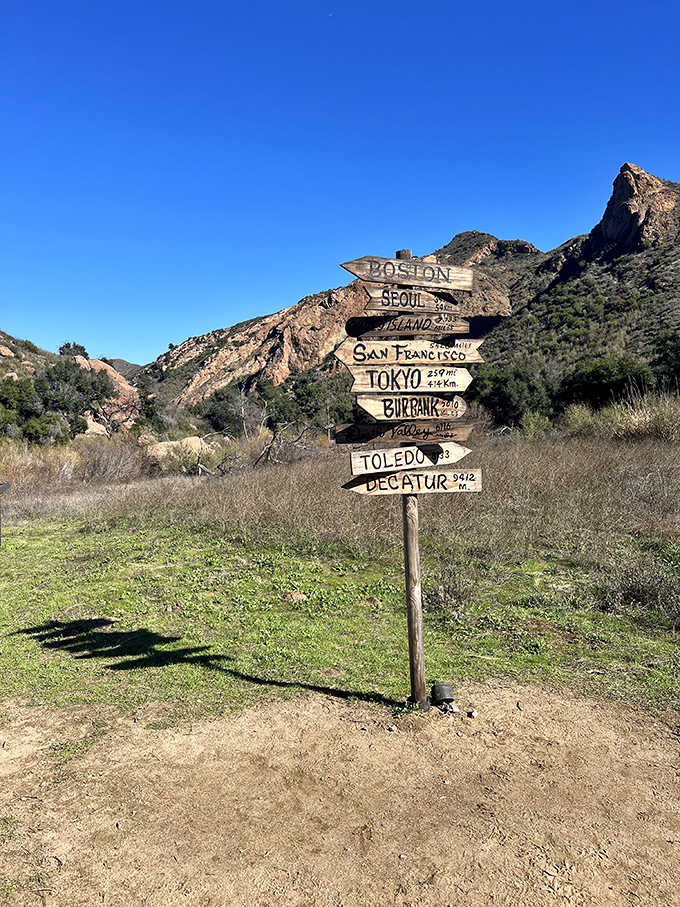 Where Hollywood once filmed MAS*H, quirky signposts point toward distant cities with wonderfully optimistic mileage estimates.