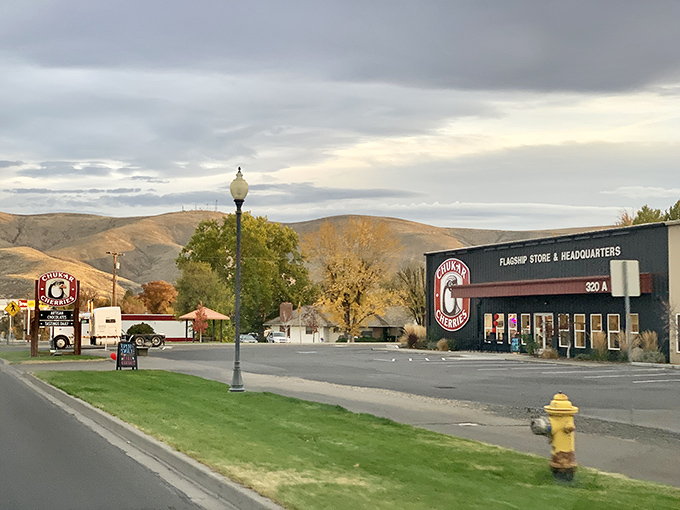 Spokane's flagship store glows with sunset magic, showing urban sophistication within reasonable commuting distance.