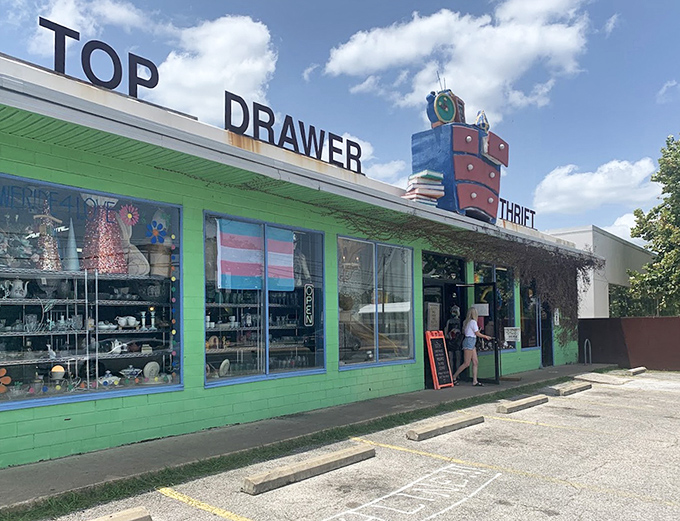Top Drawer's eye-catching green storefront with whimsical rooftop decor hints at the fun waiting inside.
