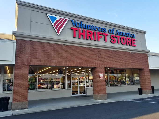 Patriotic thrifting at its finest! Columbus's VOA store wraps American colors around brick pillars like a bargain-hunting badge of honor.