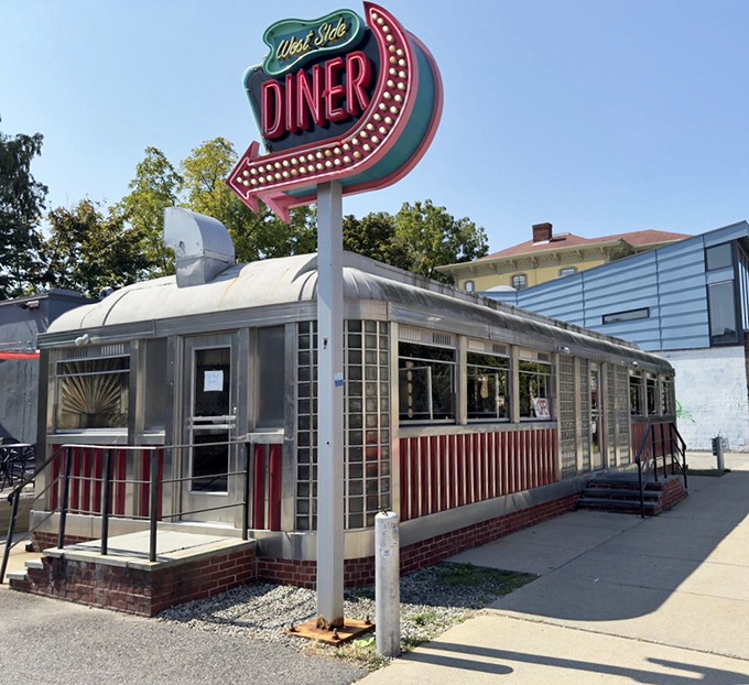 West Side Diner's gleaming silver exterior and neon sign stand as a monument to when diners were America's great democratic eating houses.