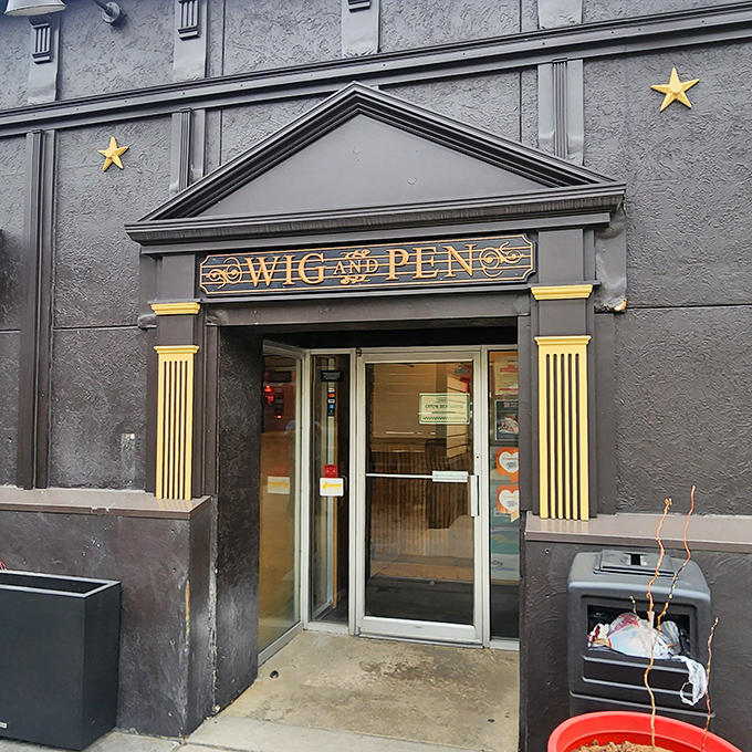 Wig & Pen's distinctive entrance looks like it belongs in a British mystery novel. The real mystery is how they fit so much flavor into one pizza.