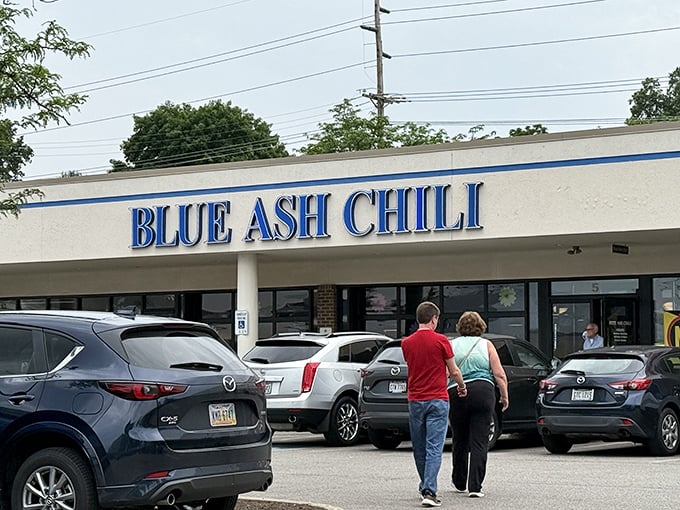 Blue Ash Chili storefront - Those "OPEN" signs aren't just business indicators&mdash;they're gateways to a Cincinnati chili experience worth writing home about.