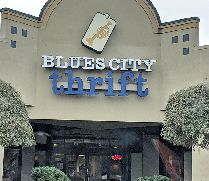 The trumpet tag logo at Blues City Thrift plays a visual fanfare. This Memphis gem harmonizes great deals with musical heritage!