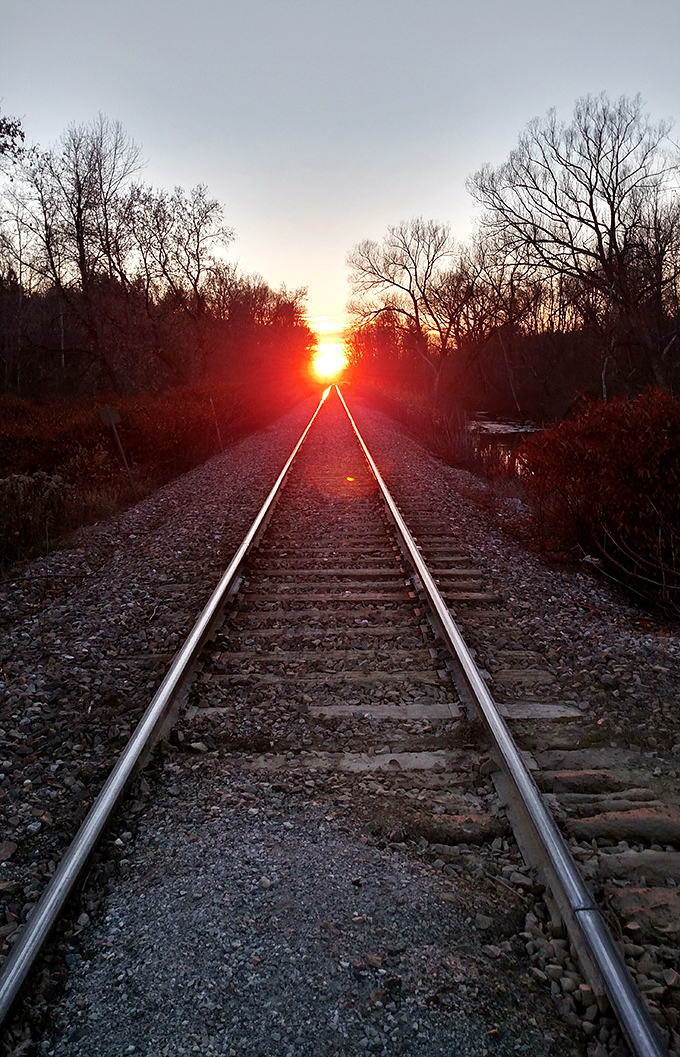 Sunset illuminates these railroad tracks in Castleton like nature's own Broadway, leading to a standing ovation of golden light.