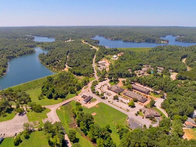 Bird's eye bliss! Cherokee Village nestles perfectly between sparkling lakes and lush forests, proving that good community planning can enhance natural beauty.
