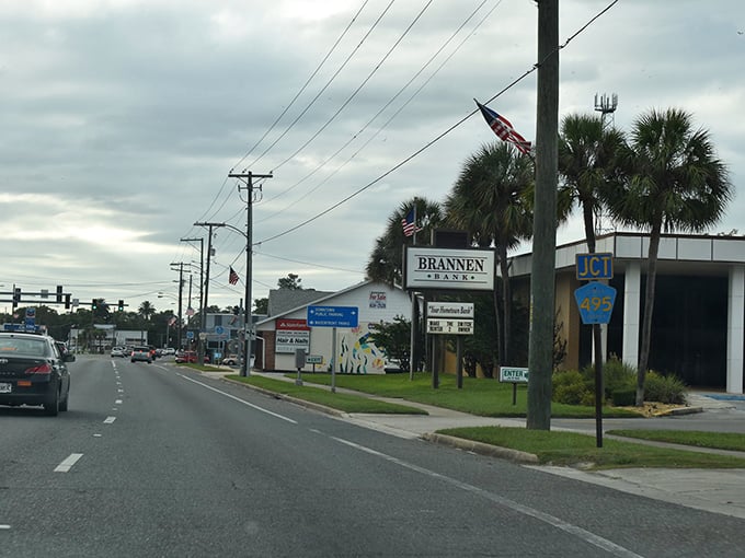 As you roll into Crystal River, palm-lined streets and friendly local businesses set the scene for a classic Florida drive filled with small-town warmth and coastal character.