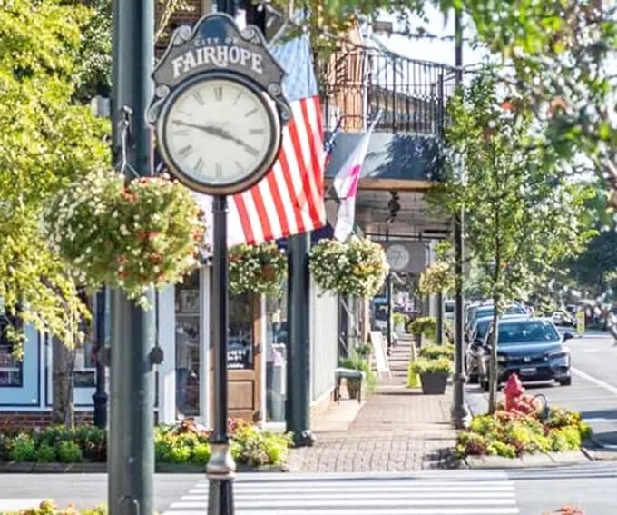 Fairhope's town clock stands guard like a patient grandfather, reminding everyone that time moves differently in special places like this.