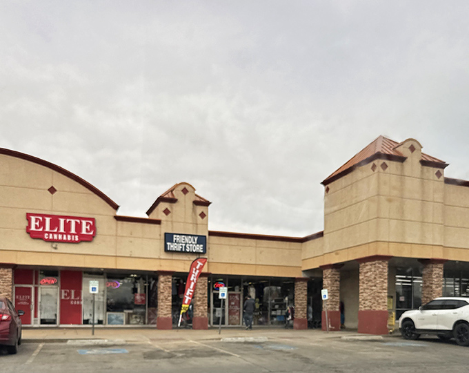 The red accents pop against the neutral building, much like the treasures pop out at you inside Friendly Thrift Store.