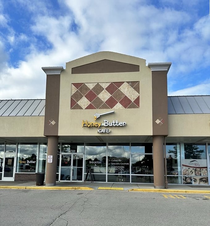 The geometric patterns and golden hues of Honey Butter Cafe hint at the creative breakfast treasures waiting inside.