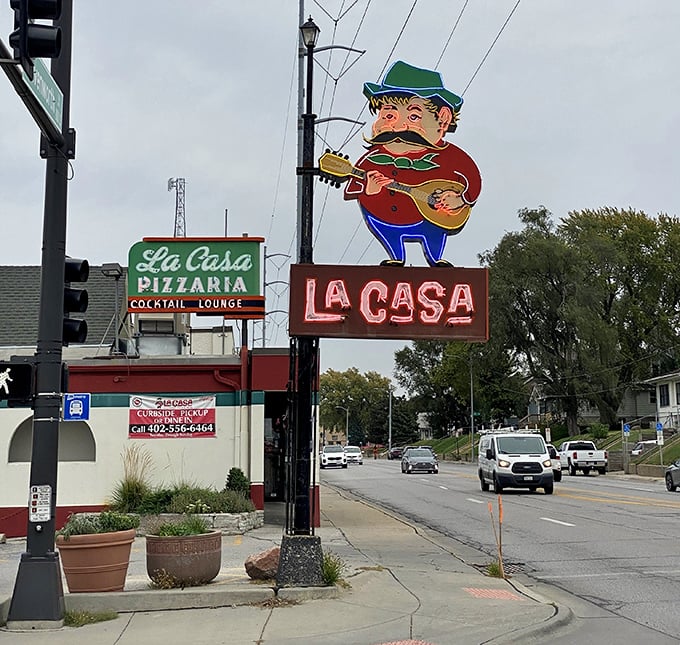 That iconic character has watched over Leavenworth Street for decades, inviting passersby to experience pizza with personality.