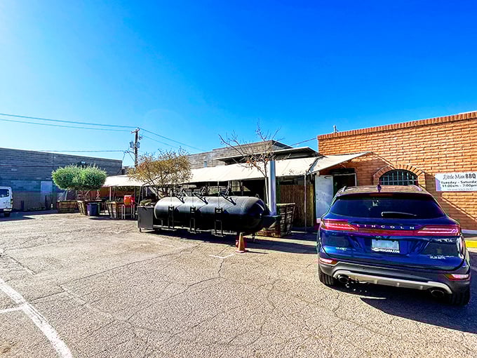 The blue car perfectly matches the blue sky&mdash;both providing beautiful backdrops to Little Miss BBQ's smoky treasures.
