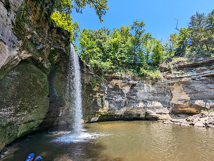 A hidden waterfall plunges into a serene pool at Minneopa State Park, nature's version of the fancy water feature your neighbor installed.