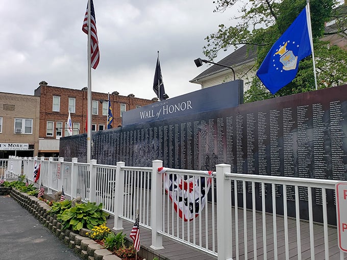 The Wall of Honor stands as Point Pleasant's tribute to those who served, a solemn reminder in this otherwise cheerful town.