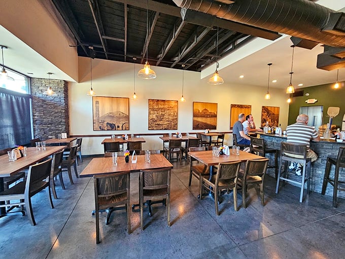 Modern design showcases ancient pizza traditions in spaces that feel both timeless and fresh.