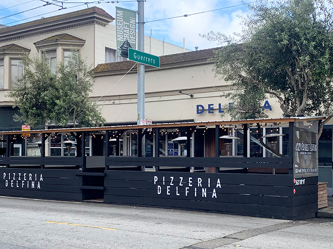 The outdoor dining parklet at Pizzeria Delfina invites Mission District diners to enjoy Neapolitan perfection under San Francisco skies.