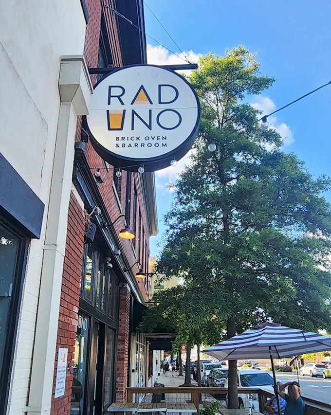 Brick walls and bright windows frame Raduno's street presence&mdash;an understated exterior hiding pizza that's anything but ordinary.