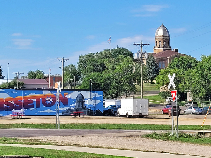 The dome of Sisseton's courthouse peeks above the treeline, a landmark for locals who appreciate both history and low property taxes.