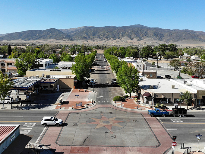 Mountains frame this desert town's main drag, where Tehachapi's affordable lifestyle unfolds beneath clear blue California skies.