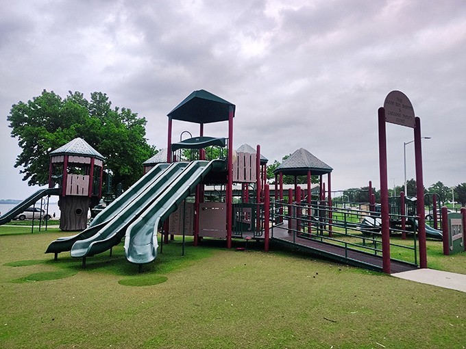 Ambuc Park's playground sits beside Lake Ponca, offering the perfect combination of childhood joy and natural beauty without the metropolitan price tag.