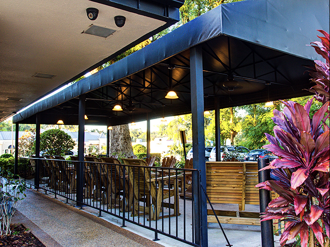 Florida's perfect climate means breakfast with a side of sunshine on this inviting patio, where tropical plants stand guard over your morning feast.