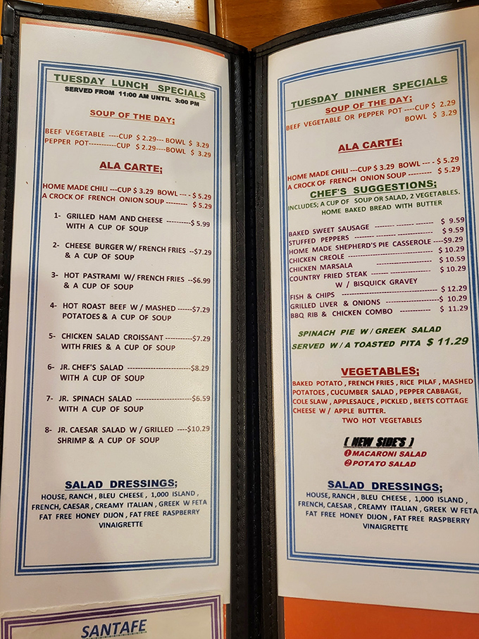 The menu reveals the true heart of any diner &ndash; Tuesday's specials promising comfort in every bite, with that Greek salad headlining like a culinary rockstar.