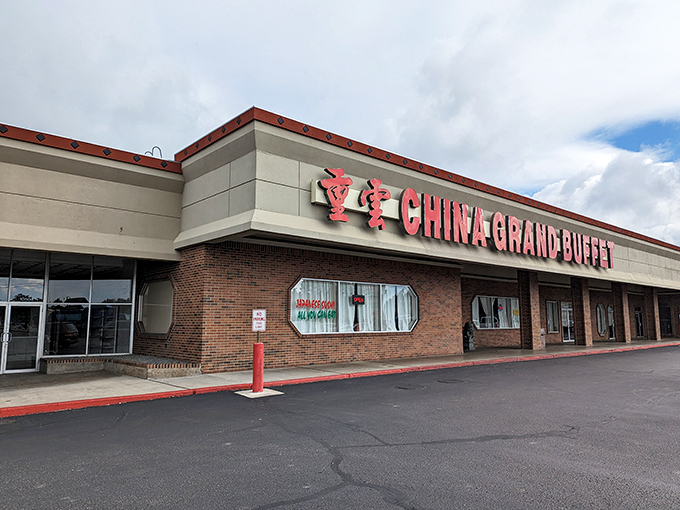 The red-trimmed exterior of China Grand Buffet stands as a beacon of culinary promise amid the Boise strip mall landscape.