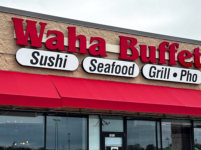 The bright red awning of Waha Buffet beckons like a culinary lighthouse, promising a voyage across oceans of flavor without leaving Wisconsin.