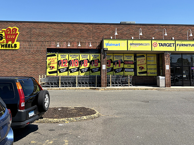 Parking lot filled with bargain hunters' vehicles &ndash; the modern-day equivalent of prospectors' wagons during the gold rush.