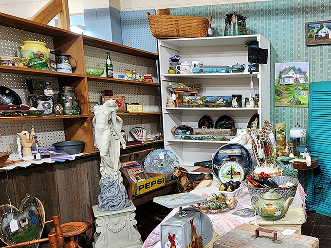 A treasure hunter's dream corner where classical statuary meets vintage Pepsi crates—proof that history's most elegant and everyday artifacts can peacefully coexist.