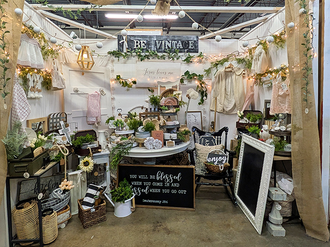 This ethereal "Be Vintage" booth feels like stumbling into a Pinterest board that's come gloriously to life, complete with fairy lights and farmhouse charm.