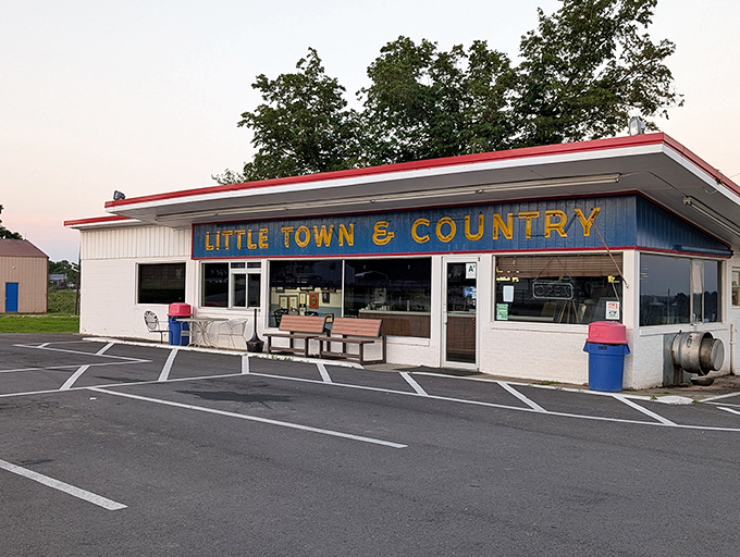 The blue and yellow sign beckons like an old friend &ndash; Little Town & Country Restaurant stands ready to serve up Kentucky comfort in its purest form.