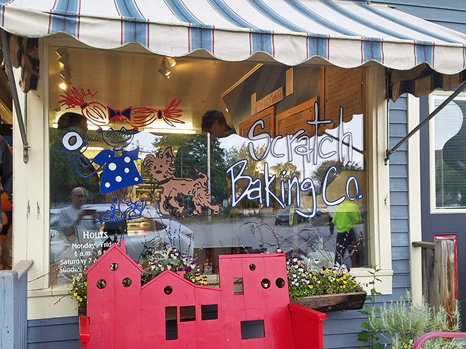 The Scratch Baking Co. welcomes you with its whimsical sign and striped awning—Maine's answer to "What does heaven look like?"
